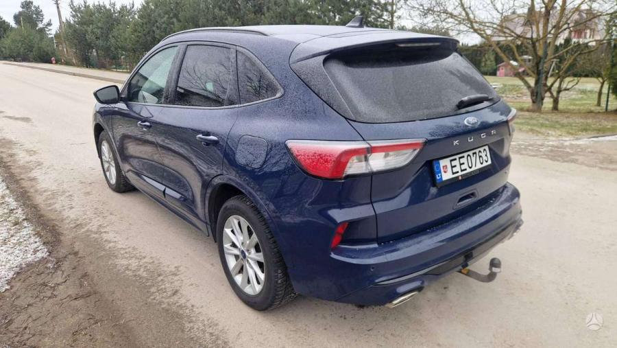 Blue Ford Kuga 2020 in Siauliai, with an engine capacity of 2.50 L and mileage of 240 thousand km for 17300 €, photo 6 on AUTOMOTO.COM.LV