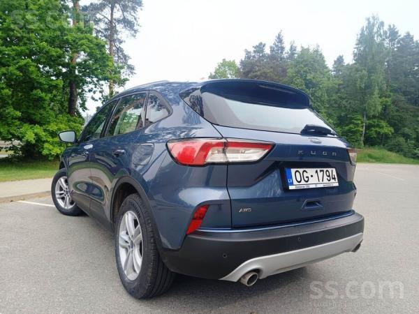 Blue Ford Kuga 2021 in Riga, with an engine capacity of 2.00 L and mileage of 67 thousand km for 16240 €, photo 7 on AUTOMOTO.COM.LV