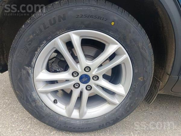 Blue Ford Kuga 2021 in Riga, with an engine capacity of 2.00 L and mileage of 67 thousand km for 16240 €, photo 10 on AUTOMOTO.COM.LV