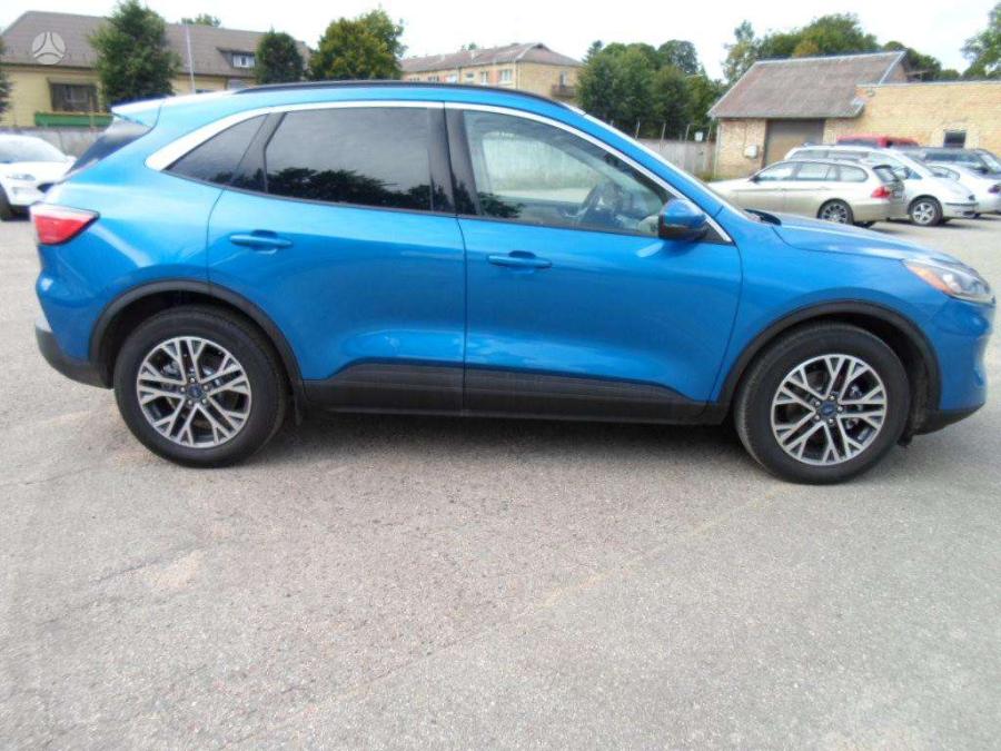 Blue Ford Kuga 2021 in Siauliai, with an engine capacity of 2.00 L and mileage of 65 thousand km for 16200 €, photo 7 on AUTOMOTO.COM.LV