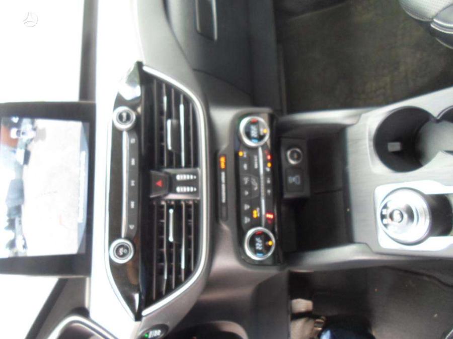 Blue Ford Kuga 2021 in Siauliai, with an engine capacity of 2.00 L and mileage of 65 thousand km for 16200 €, photo 28 on AUTOMOTO.COM.LV