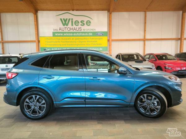 Blue Ford Kuga 2023 in Kaunas, with an engine capacity of 2.50 L and mileage of 19 thousand km for 30914 €, photo 1 on AUTOMOTO.COM.LV