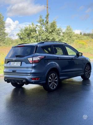 Blue Ford Kuga 2019 in Vilnius, with an engine capacity of 2.20 L and mileage of 129 thousand km for 12000 €, photo 4 on AUTOMOTO.COM.LV