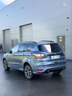 Blue Ford Kuga 2019 in Vilnius, with an engine capacity of 2.20 L and mileage of 129 thousand km for 12000 €, photo 5 on AUTOMOTO.COM.LV