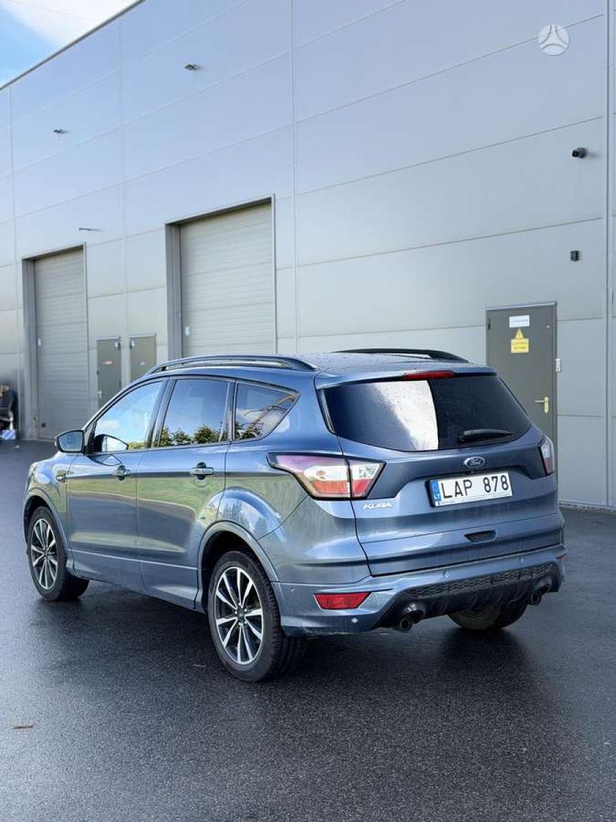 Blue Ford Kuga 2019 in Vilnius, with an engine capacity of 2.20 L and mileage of 129 thousand km for 12000 €, photo 5 on AUTOMOTO.COM.LV
