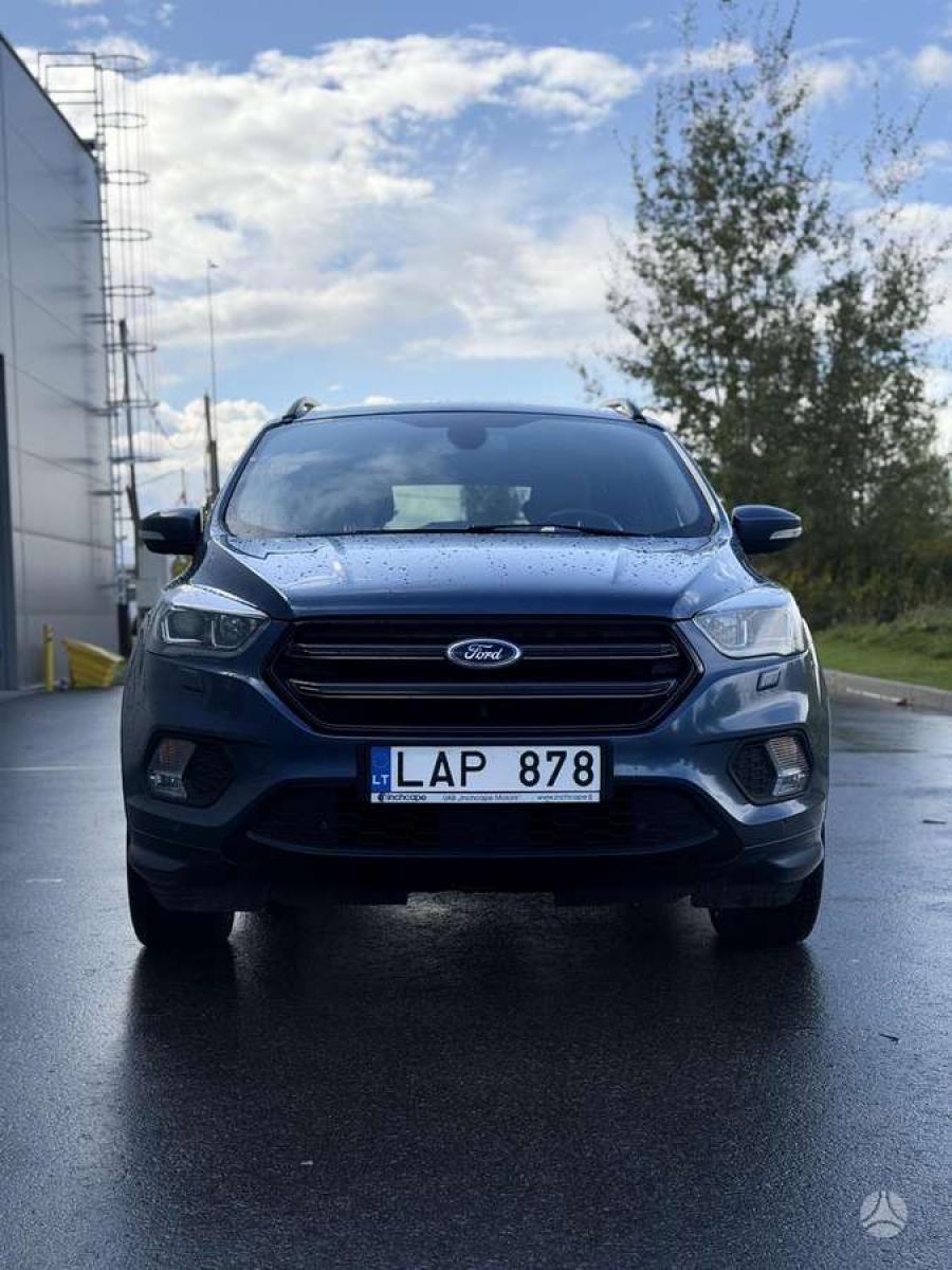 Blue Ford Kuga 2019 in Vilnius, with an engine capacity of 2.20 L and mileage of 129 thousand km for 12000 €, photo 6 on AUTOMOTO.COM.LV
