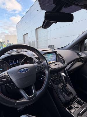 Blue Ford Kuga 2019 in Vilnius, with an engine capacity of 2.20 L and mileage of 129 thousand km for 12000 €, photo 9 on AUTOMOTO.COM.LV