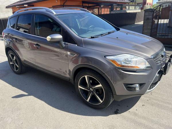 Brown Ford Kuga 2011 in Kaunas, with an engine capacity of 2.00 L and mileage of 298 thousand km for 4400 €, photo 4 on AUTOMOTO.COM.LV