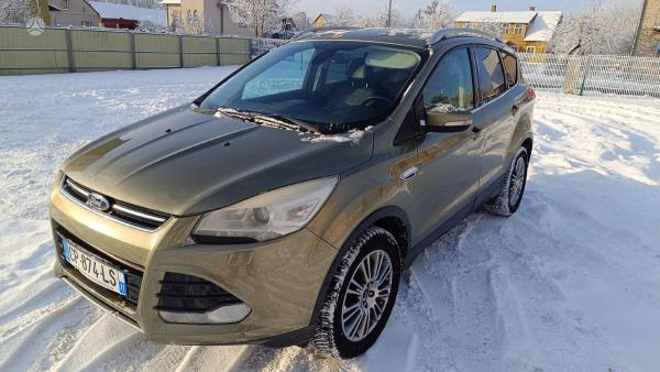 Brown Ford Kuga 2013 in Taurage, with an engine capacity of 1.60 L and mileage of 215 thousand km for 6900 €, photo 1 on AUTOMOTO.COM.LV