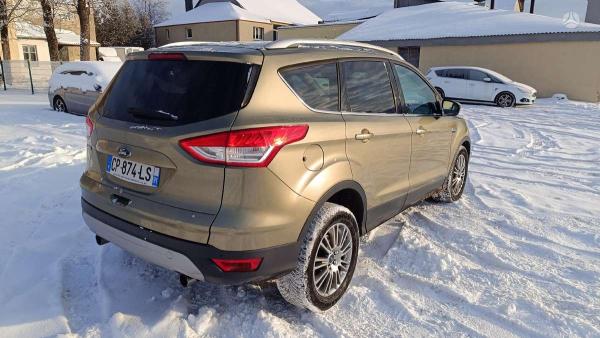 Brown Ford Kuga 2013 in Taurage, with an engine capacity of 1.60 L and mileage of 215 thousand km for 6900 €, photo 4 on AUTOMOTO.COM.LV