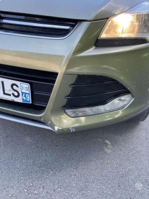 Brown Ford Kuga 2013 in Taurage, with an engine capacity of 0.00 L and mileage of 260 thousand km for 4700 €, photo 14 on AUTOMOTO.COM.LV