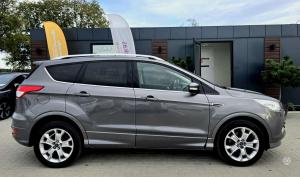 Brown Ford Kuga 2013 in Taurage, with an engine capacity of 2.00 L and mileage of 234 thousand km for 7200 €, photo 7 on AUTOMOTO.COM.LV