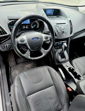 Brown Ford Kuga 2013 in Taurage, with an engine capacity of 2.00 L and mileage of 234 thousand km for 7200 €, photo 26 on AUTOMOTO.COM.LV