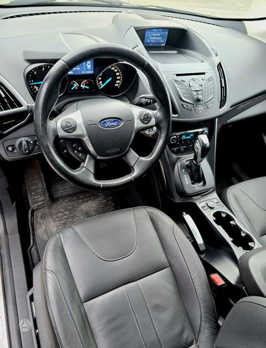 Brown Ford Kuga 2013 in Taurage, with an engine capacity of 2.00 L and mileage of 234 thousand km for 7200 €, photo 26 on AUTOMOTO.COM.LV