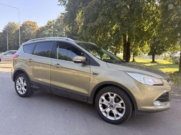 Brown Ford Kuga 2013 in Taurage, with an engine capacity of 2.00 L and mileage of 270 thousand km for 4400 €, photo 3 on AUTOMOTO.COM.LV