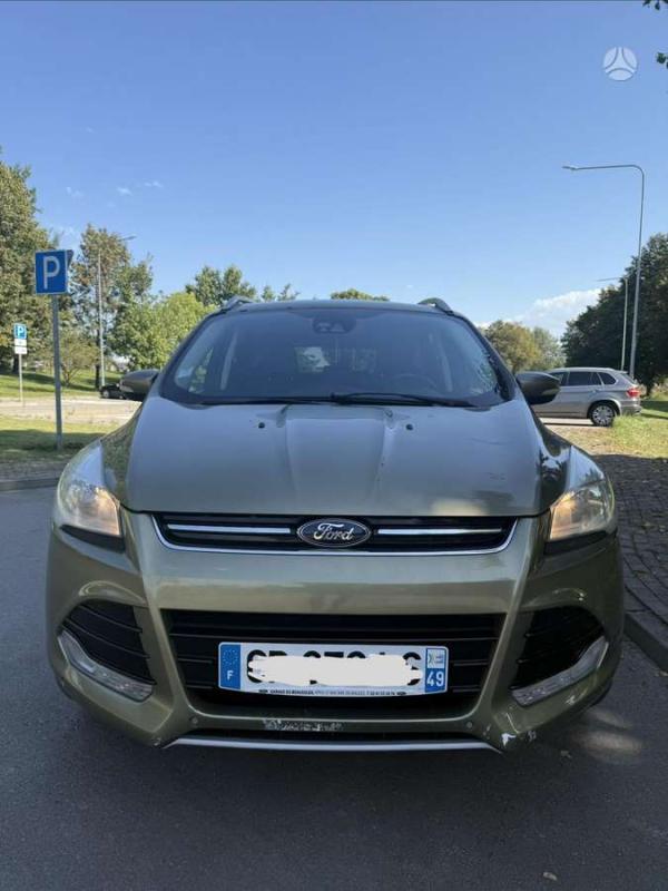 Brown Ford Kuga 2013 in Taurage, with an engine capacity of 2.00 L and mileage of 270 thousand km for 4400 €, photo 4 on AUTOMOTO.COM.LV