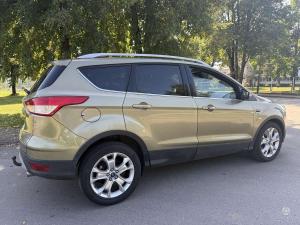 Brown Ford Kuga 2013 in Taurage, with an engine capacity of 2.00 L and mileage of 270 thousand km for 4400 €, photo 5 on AUTOMOTO.COM.LV