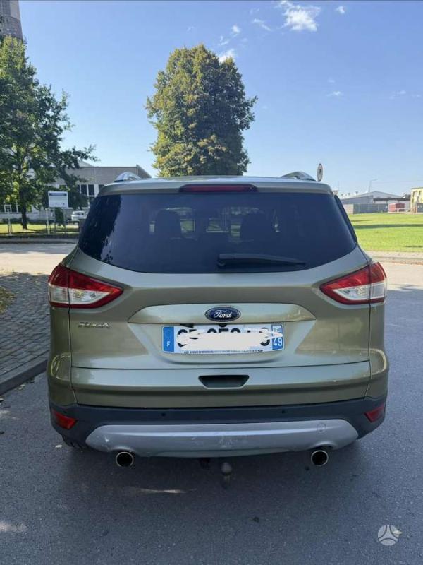 Brown Ford Kuga 2013 in Taurage, with an engine capacity of 2.00 L and mileage of 270 thousand km for 4400 €, photo 7 on AUTOMOTO.COM.LV