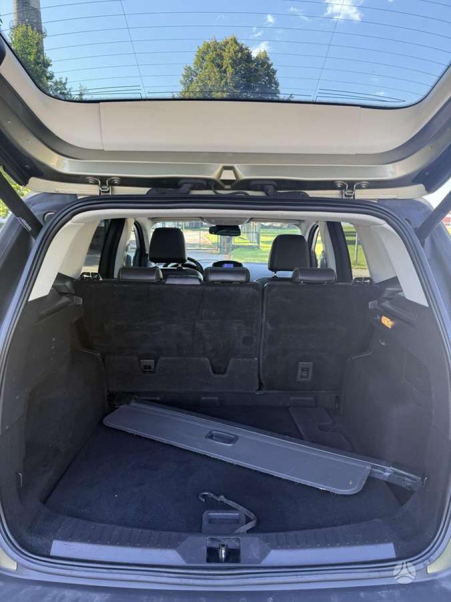 Brown Ford Kuga 2013 in Taurage, with an engine capacity of 2.00 L and mileage of 270 thousand km for 4400 €, photo 12 on AUTOMOTO.COM.LV