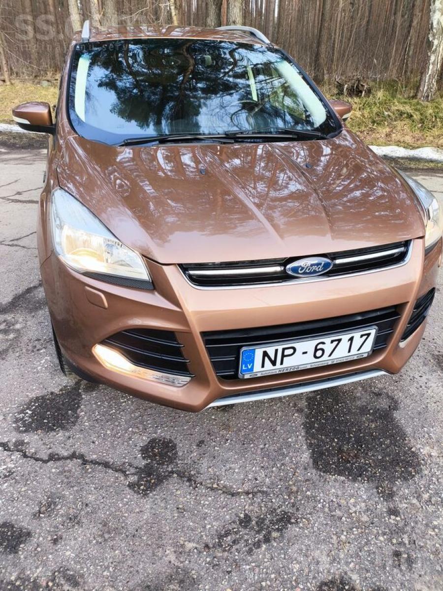 Brown Ford Kuga 2014 in Jelgava, with an engine capacity of 2.00 L and mileage of 196 thousand km for 10900 €, photo 1 on AUTOMOTO.COM.LV