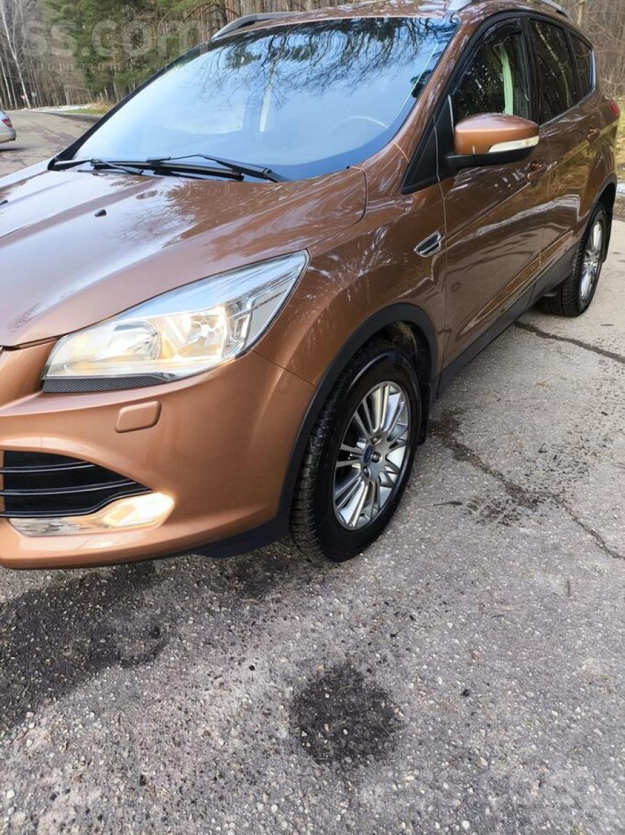 Brown Ford Kuga 2014 in Jelgava, with an engine capacity of 2.00 L and mileage of 196 thousand km for 10900 €, photo 6 on AUTOMOTO.COM.LV