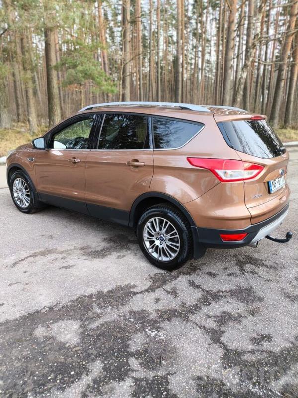 Brown Ford Kuga 2014 in Jelgava, with an engine capacity of 2.00 L and mileage of 196 thousand km for 10900 €, photo 6 on AUTOMOTO.COM.LV