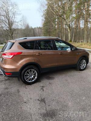 Brown Ford Kuga 2014 in Jelgava, with an engine capacity of 2.00 L and mileage of 196 thousand km for 10900 €, photo 8 on AUTOMOTO.COM.LV