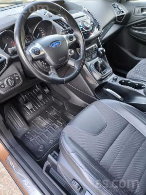 Brown Ford Kuga 2014 in Jelgava, with an engine capacity of 2.00 L and mileage of 196 thousand km for 10900 €, photo 11 on AUTOMOTO.COM.LV