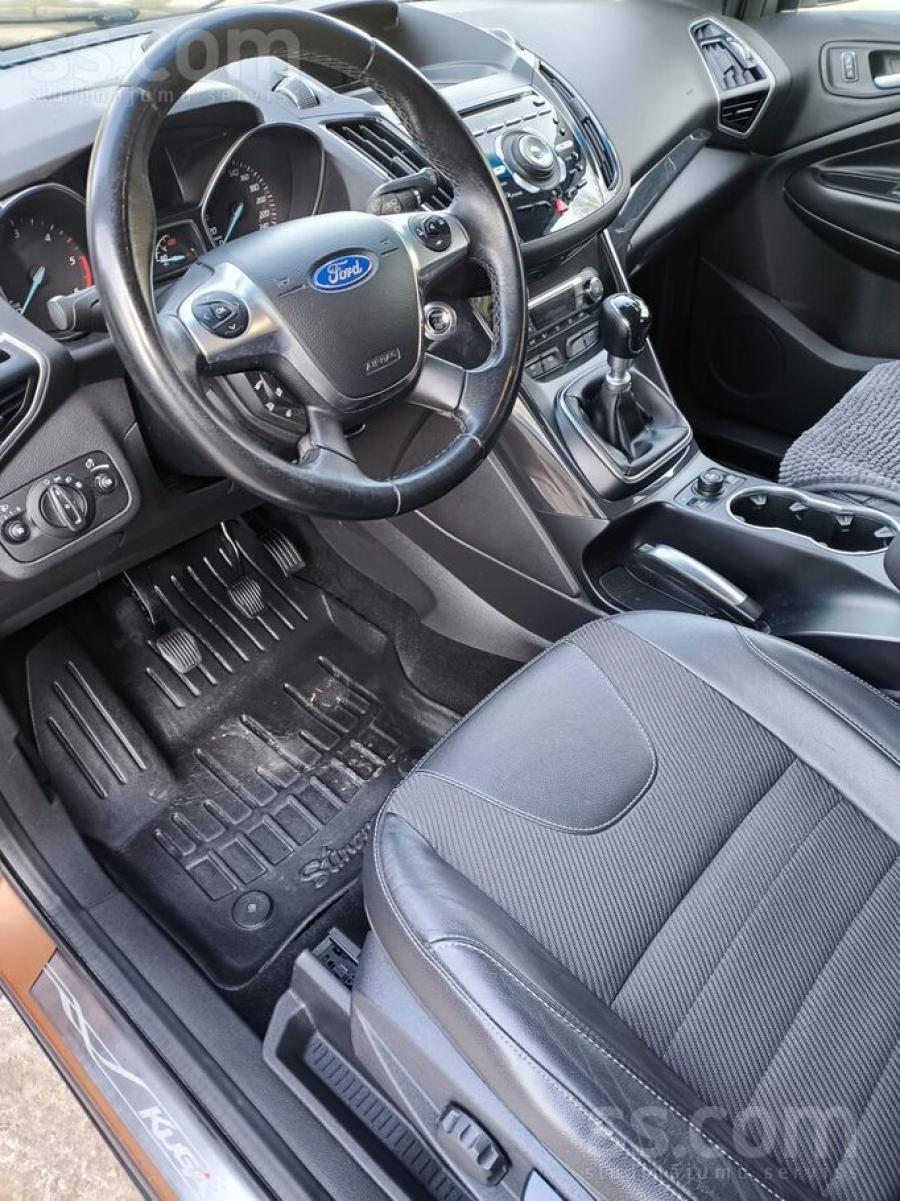 Brown Ford Kuga 2014 in Jelgava, with an engine capacity of 2.00 L and mileage of 196 thousand km for 10900 €, photo 11 on AUTOMOTO.COM.LV