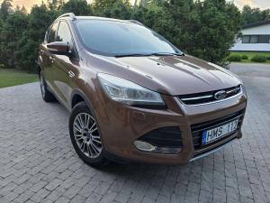 Brown Ford Kuga 2014 in Utena, with an engine capacity of 2.00 L and mileage of 238 thousand km for 4900 €, photo  on AUTOMOTO.COM.LV