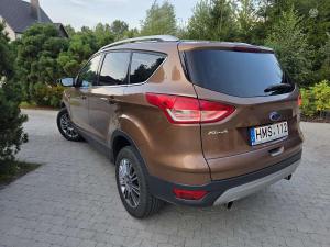 Brown Ford Kuga 2014 in Utena, with an engine capacity of 2.00 L and mileage of 238 thousand km for 4900 €, photo 3 on AUTOMOTO.COM.LV