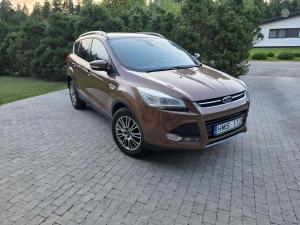 Brown Ford Kuga 2014 in Utena, with an engine capacity of 2.00 L and mileage of 238 thousand km for 4900 €, photo 4 on AUTOMOTO.COM.LV