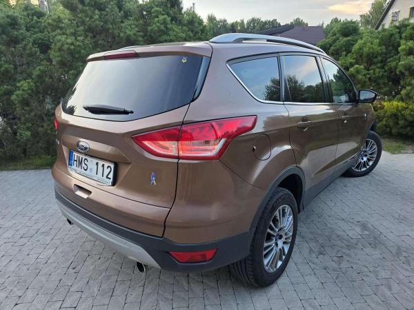 Brown Ford Kuga 2014 in Utena, with an engine capacity of 2.00 L and mileage of 238 thousand km for 4900 €, photo 4 on AUTOMOTO.COM.LV