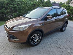 Brown Ford Kuga 2014 in Utena, with an engine capacity of 2.00 L and mileage of 238 thousand km for 4900 €, photo 7 on AUTOMOTO.COM.LV