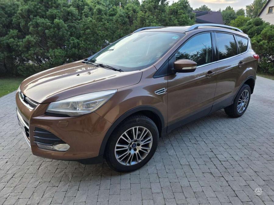 Brown Ford Kuga 2014 in Utena, with an engine capacity of 2.00 L and mileage of 238 thousand km for 4900 €, photo 7 on AUTOMOTO.COM.LV
