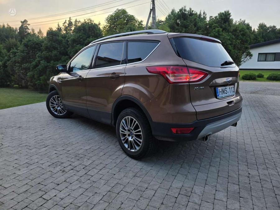 Brown Ford Kuga 2014 in Utena, with an engine capacity of 2.00 L and mileage of 238 thousand km for 4900 €, photo 8 on AUTOMOTO.COM.LV