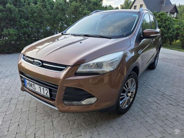 Brown Ford Kuga 2014 in Utena, with an engine capacity of 2.00 L and mileage of 238 thousand km for 4900 €, photo 8 on AUTOMOTO.COM.LV