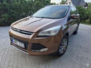 Brown Ford Kuga 2014 in Utena, with an engine capacity of 2.00 L and mileage of 238 thousand km for 4900 €, photo 9 on AUTOMOTO.COM.LV