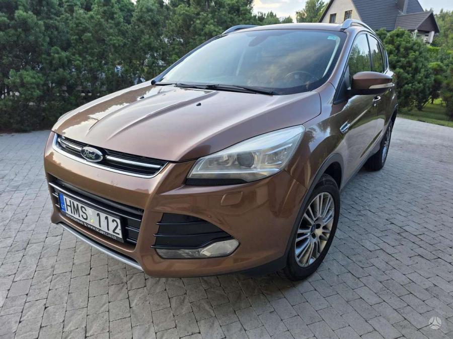 Brown Ford Kuga 2014 in Utena, with an engine capacity of 2.00 L and mileage of 238 thousand km for 4900 €, photo 9 on AUTOMOTO.COM.LV
