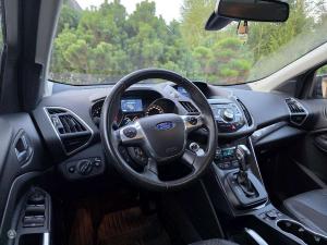 Brown Ford Kuga 2014 in Utena, with an engine capacity of 2.00 L and mileage of 238 thousand km for 4900 €, photo 15 on AUTOMOTO.COM.LV