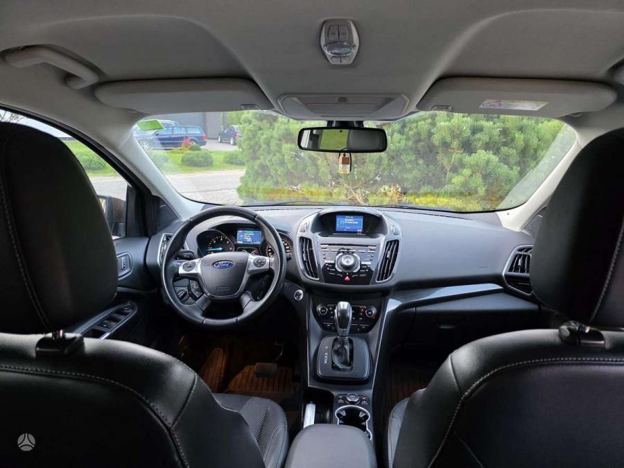 Brown Ford Kuga 2014 in Utena, with an engine capacity of 2.00 L and mileage of 238 thousand km for 4900 €, photo 18 on AUTOMOTO.COM.LV