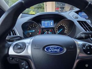 Brown Ford Kuga 2014 in Utena, with an engine capacity of 2.00 L and mileage of 238 thousand km for 4900 €, photo 21 on AUTOMOTO.COM.LV