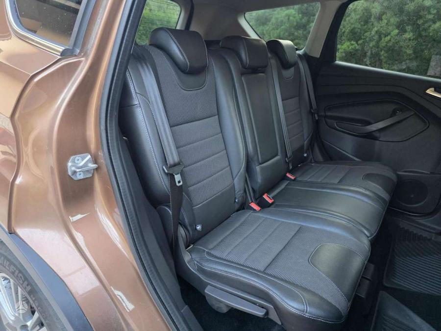 Brown Ford Kuga 2014 in Utena, with an engine capacity of 2.00 L and mileage of 238 thousand km for 4900 €, photo 30 on AUTOMOTO.COM.LV