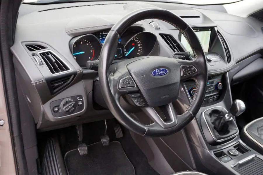 Brown Ford Kuga 2018 in Riga, with an engine capacity of 2.00 L and mileage of 199 thousand km for 11970 €, photo 24 on AUTOMOTO.COM.LV