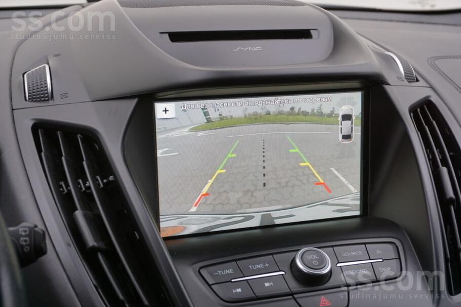 Brown Ford Kuga 2018 in Riga, with an engine capacity of 2.00 L and mileage of 199 thousand km for 10970 €, photo 29 on AUTOMOTO.COM.LV