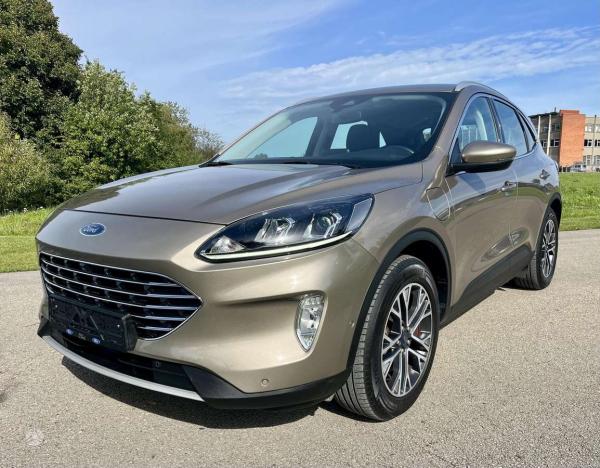 Ford Kuga 2020 Šauļi vietnē Brūns Ford Kuga 2020 Šauļi, ar dzinēja tilpumu 2.50 L un nobraukumu 100 tūkst. km par 14750 €, foto 1 vietnē AUTOMOTO.COM.LV