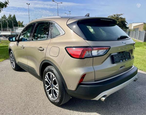 Ford Kuga 2020 Šauļi vietnē Brūns Ford Kuga 2020 Šauļi, ar dzinēja tilpumu 2.50 L un nobraukumu 100 tūkst. km par 14750 €, foto 6 vietnē AUTOMOTO.COM.LV
