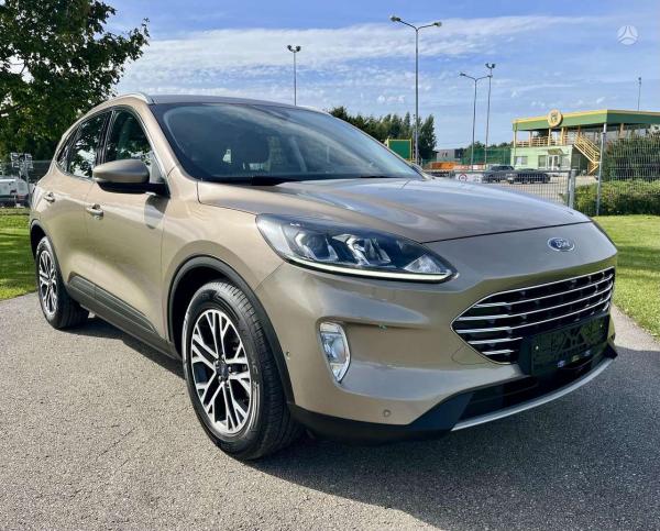 Ford Kuga 2020 Šauļi vietnē Brūns Ford Kuga 2020 Šauļi, ar dzinēja tilpumu 2.50 L un nobraukumu 100 tūkst. km par 14750 €, foto 8 vietnē AUTOMOTO.COM.LV