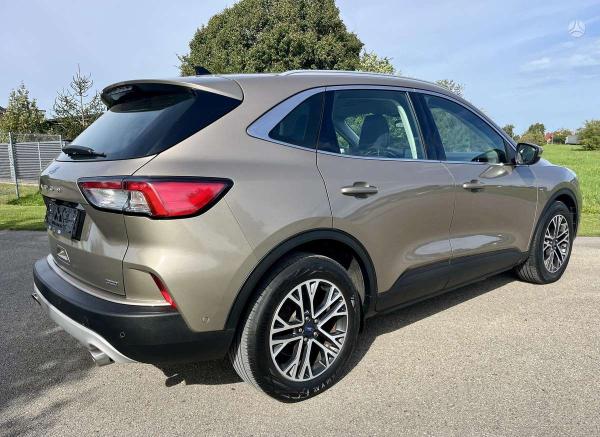 Ford Kuga 2020 Šauļi vietnē Brūns Ford Kuga 2020 Šauļi, ar dzinēja tilpumu 2.50 L un nobraukumu 100 tūkst. km par 14750 €, foto 11 vietnē AUTOMOTO.COM.LV
