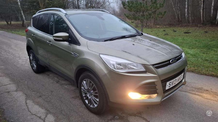 Green Ford Kuga 2013 in Siauliai, with an engine capacity of 2.00 L and mileage of 123 thousand km for 2998 €, photo 3 on AUTOMOTO.COM.LV